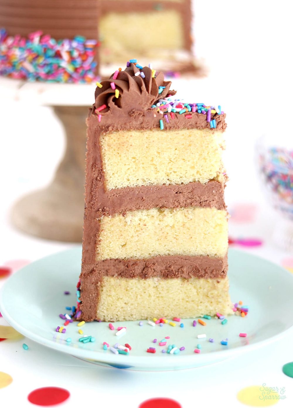 The Fluffiest Yellow Cake Recipe + Chocolate Frosting - Sugar & Sparrow